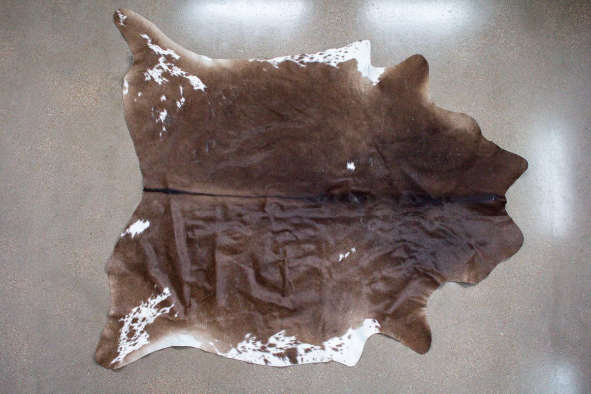 Benedict Cowhide Rug - Sugar Creek Event Rentals